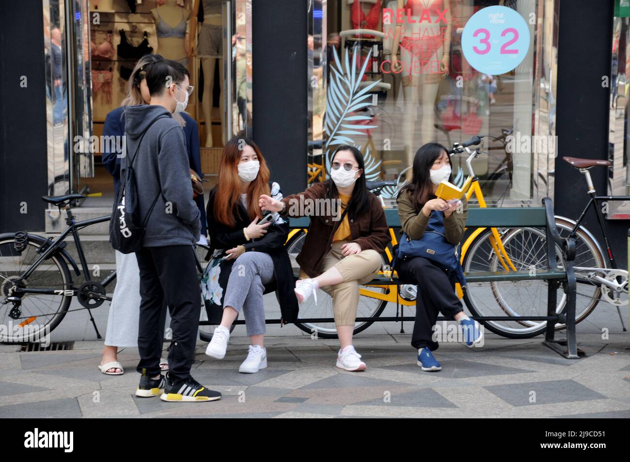 Copenhagen/Denmark/22 May 2022/Asian travellers wears face mask on ...