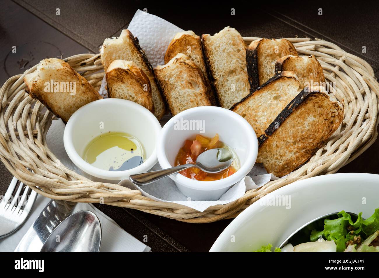 Toasted bread for starter at italian restaurant Stock Photo - Alamy