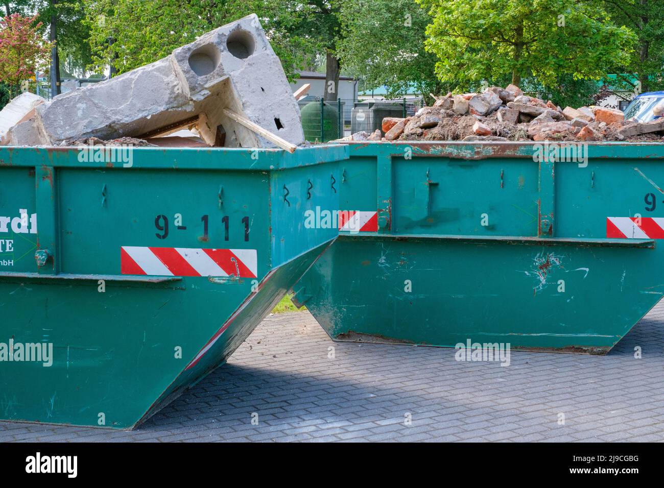 in large containers there is the waste from a house demolition Stock ...