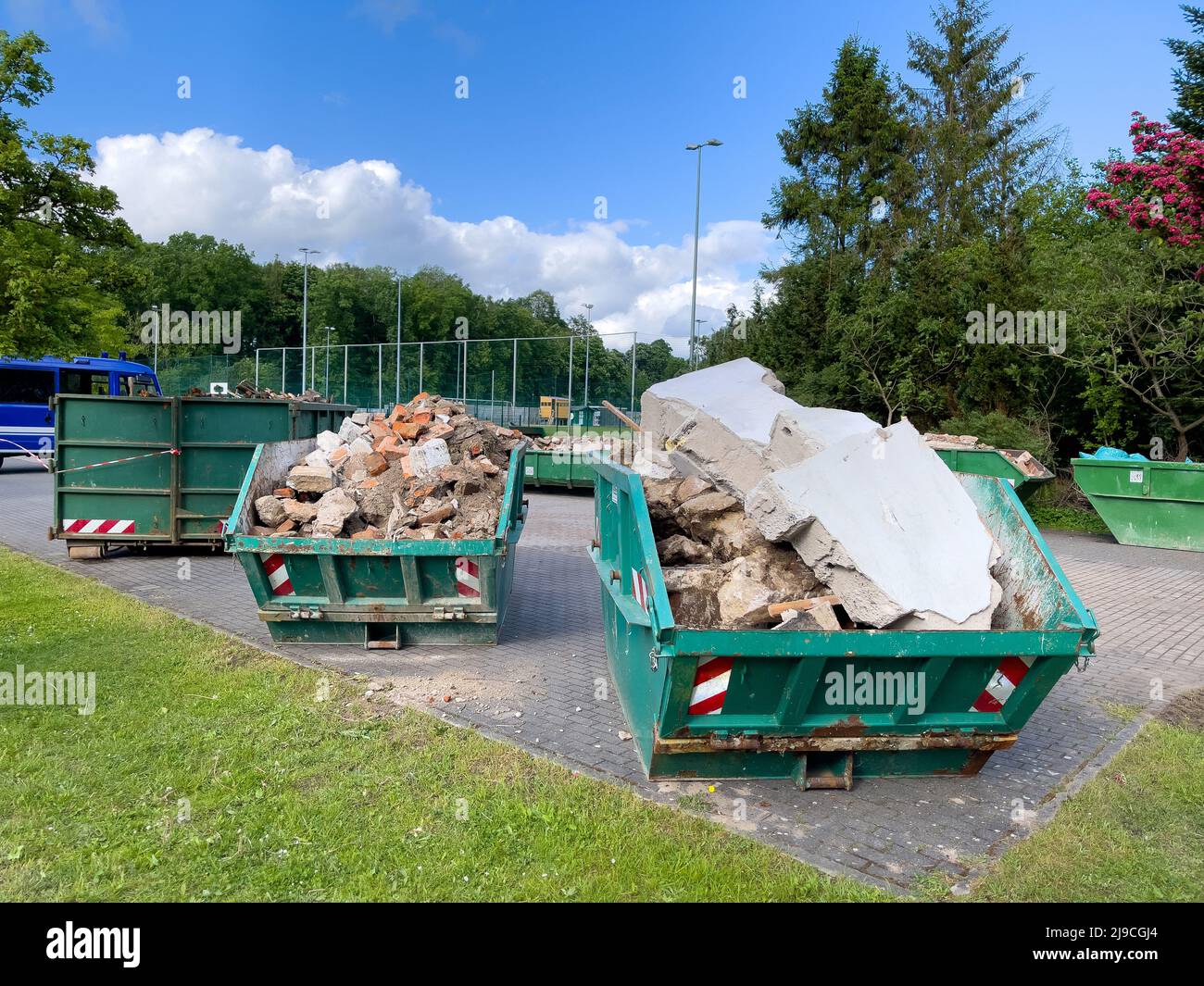 in large containers there is the waste from a house demolition Stock ...