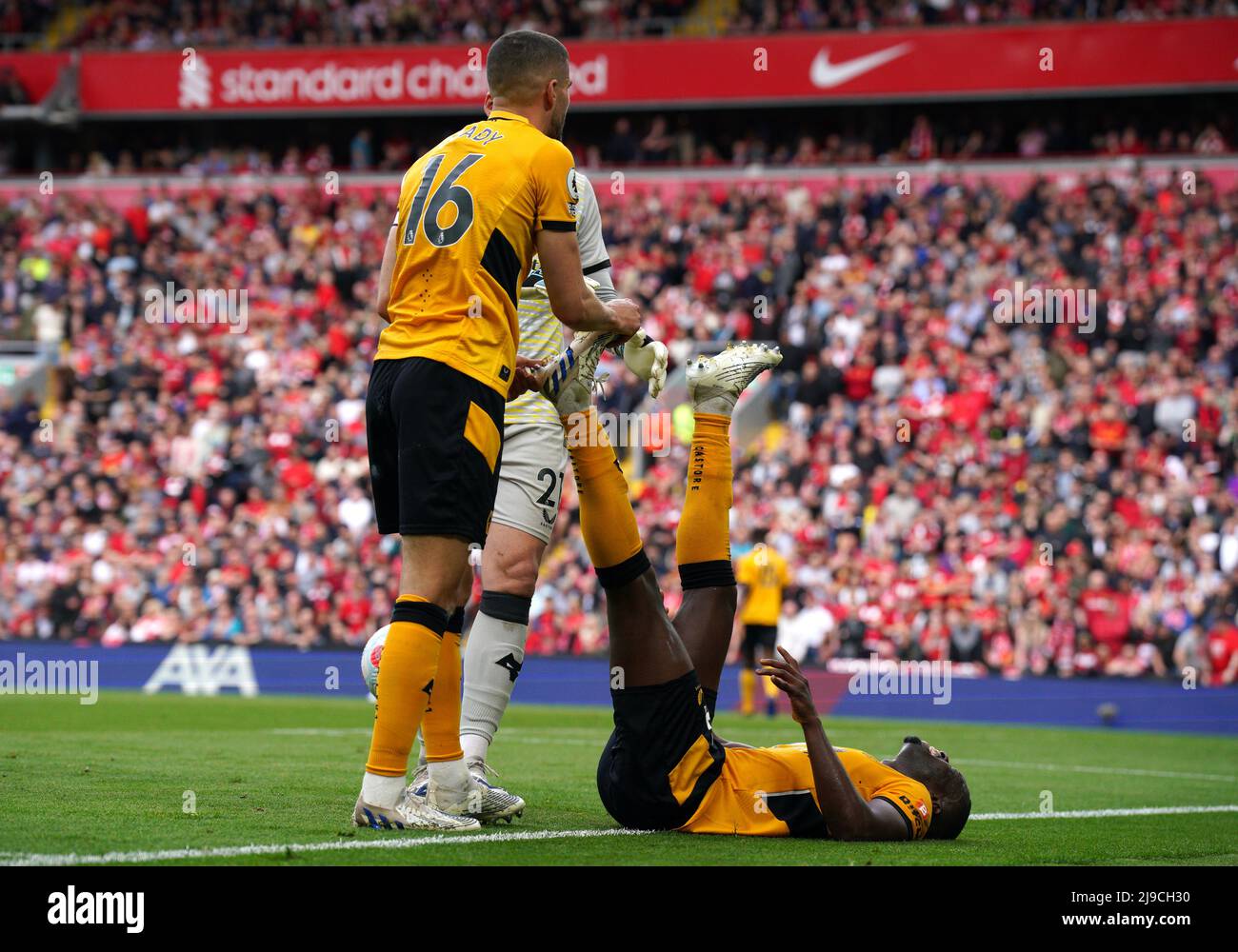 Wolverhampton Wanderers' Toti Gomes reacts on the floor during the ...
