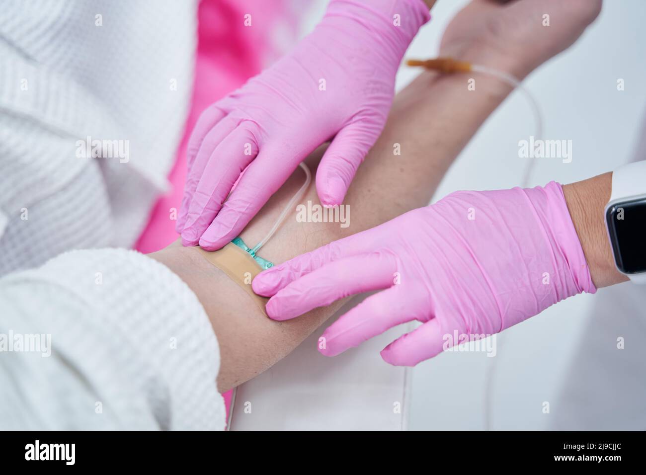 Close up photo of IV infusion in wellness clinic Stock Photo - Alamy