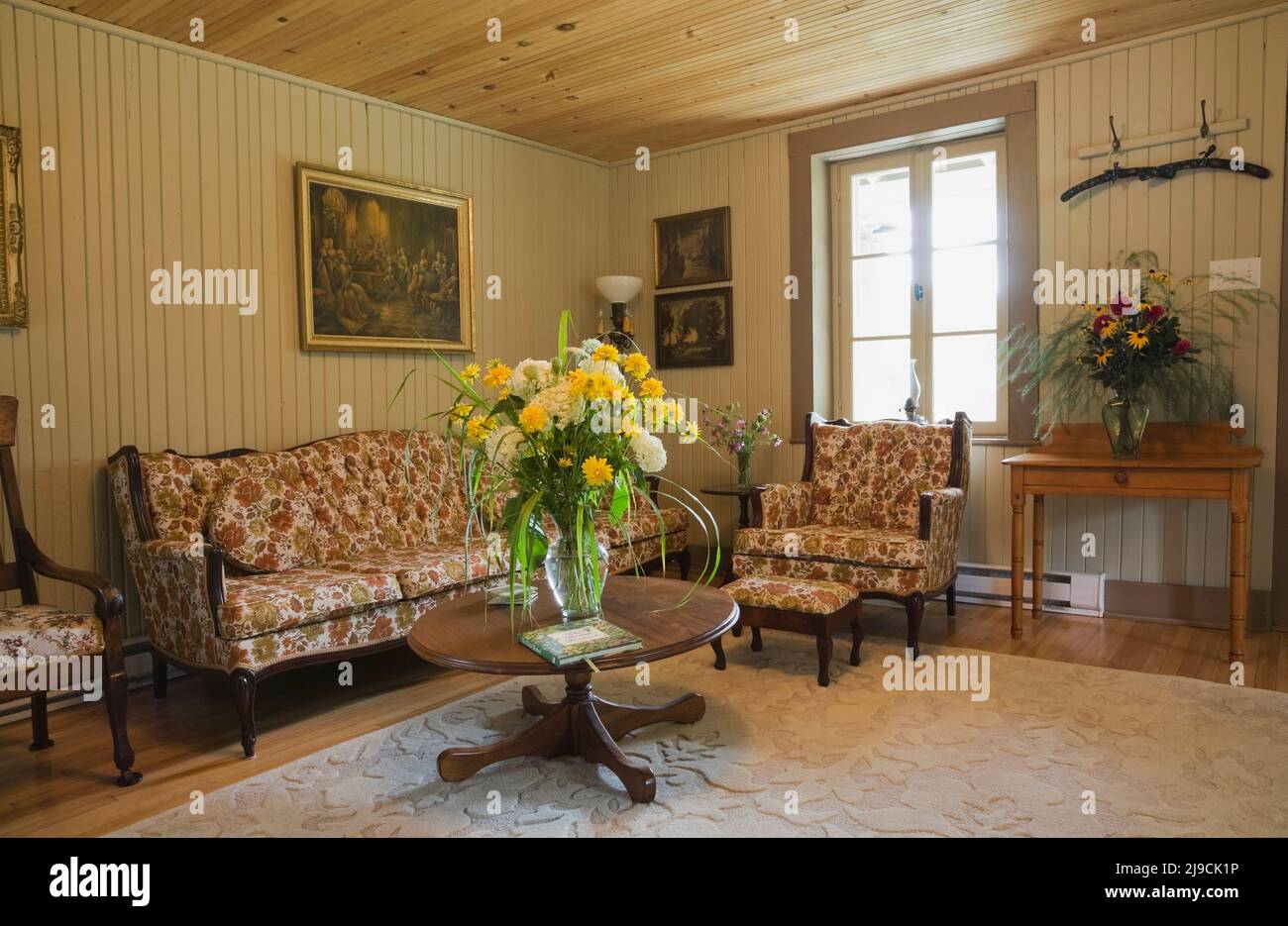 Antique coffee table, sofa, armchair with flowery patterns and ...