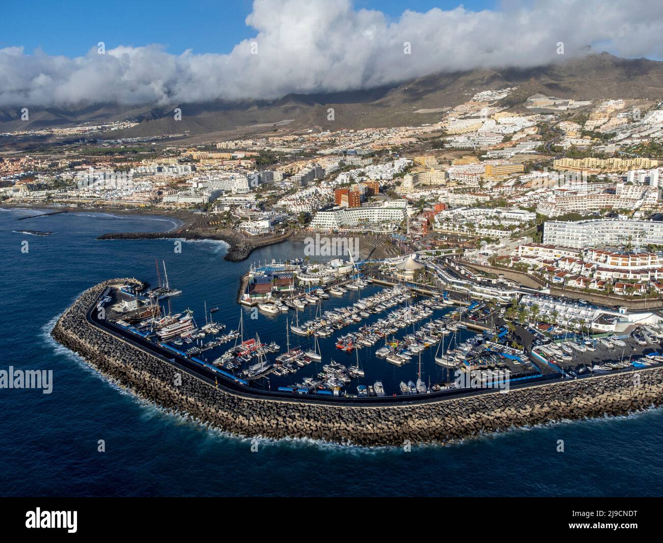 Aerial view on costline with sandy beaches and yachts harbor Puerto ...