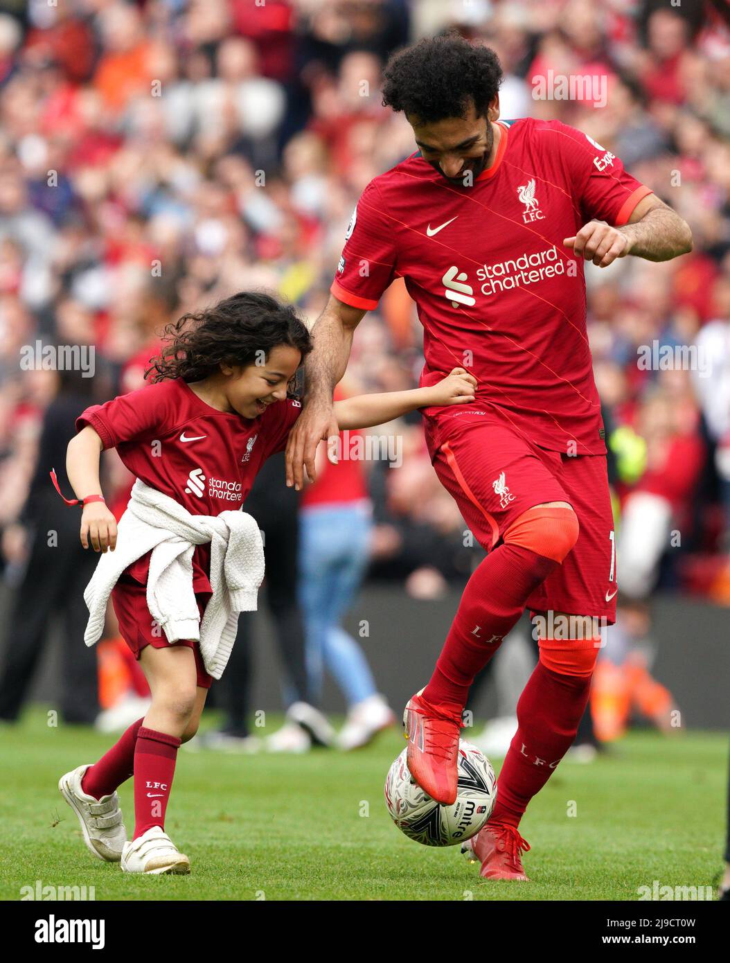 Liverpool's Mohamed Salah plays football with his daughter Makka ...