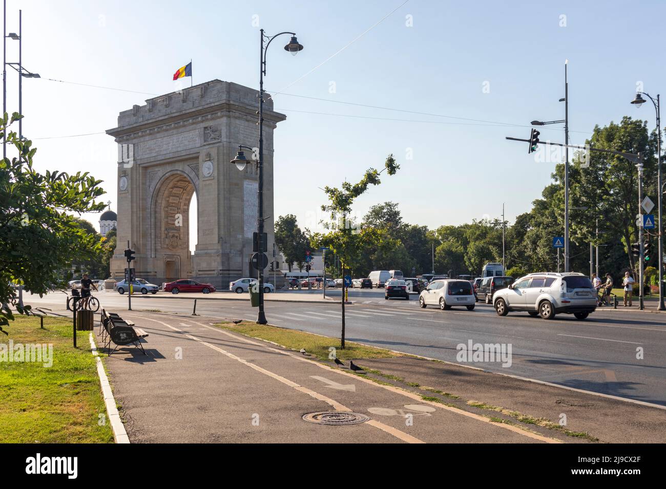 BUCHAREST, ROMANIA - AUGUST 17, 2021: Sunset view of Arch of Triumph in ...