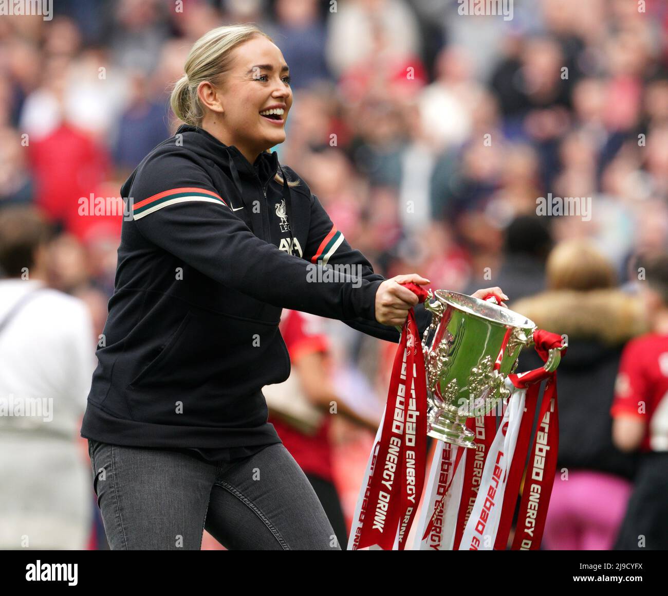 Liverpool assistant nutritionist Lorna Butler holds the Carabao Cup ...