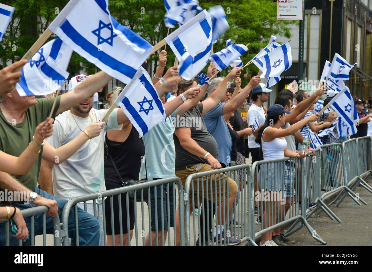 Spectators gathered to celebrate the annual Israel Day Parade along ...