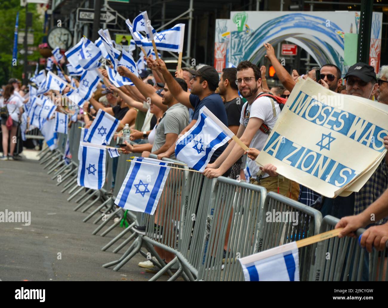 Spectators gathered to celebrate the annual Israel Day Parade along ...