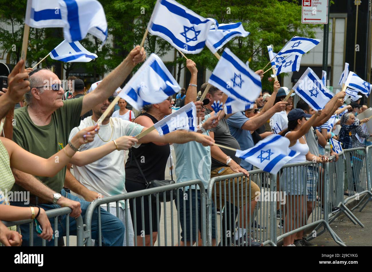 Spectators gathered to celebrate the annual Israel Day Parade along ...