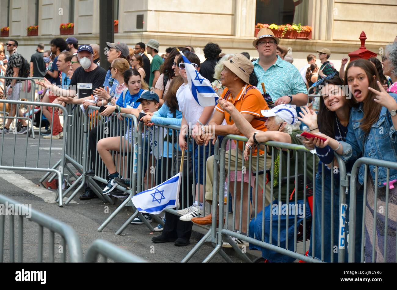 Spectators gathered to celebrate the annual Israel Day Parade along ...
