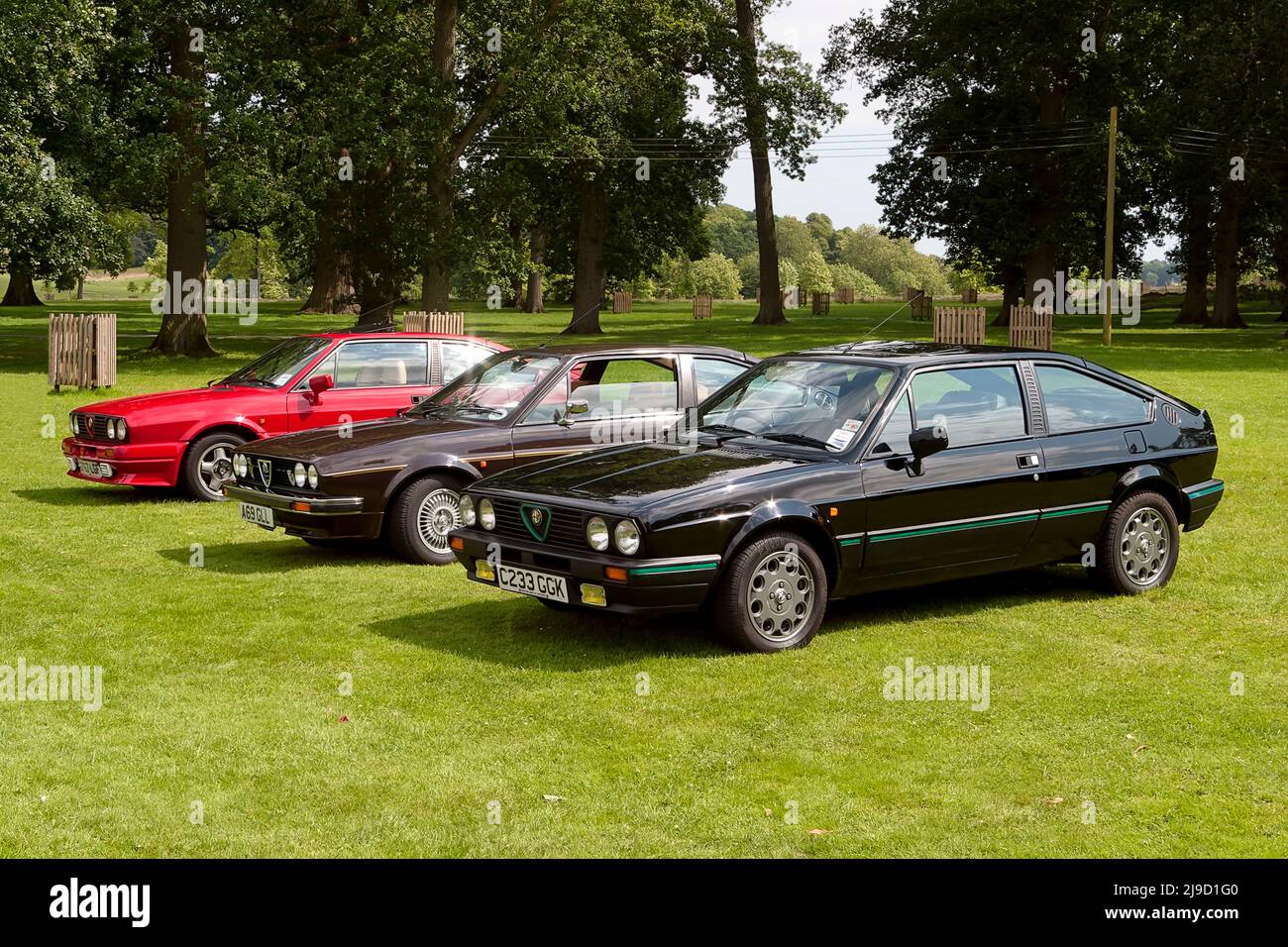 Warminster, Wiltshire, UK - July 25 2004: A line-up of classic Alfa ...