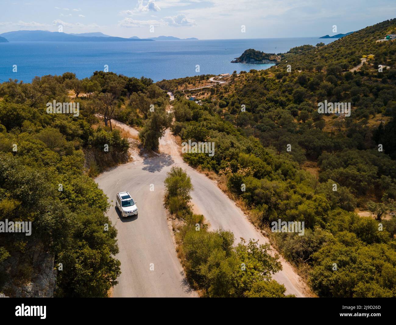 aerial view of car moving by road at Lefkada island Greece near ionian ...