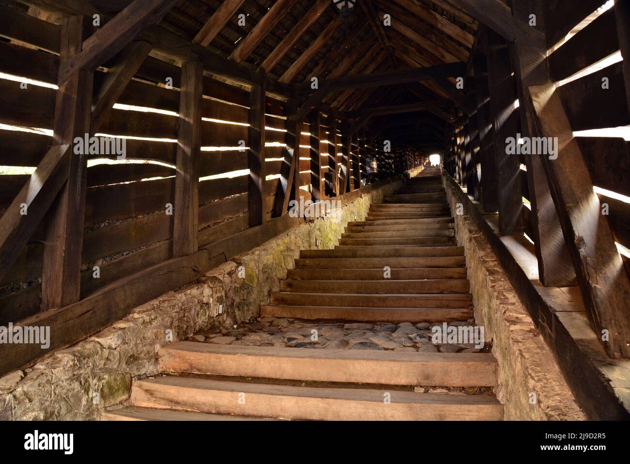 Old and emblematic covered staircase in the medieval town of Sighisoara ...
