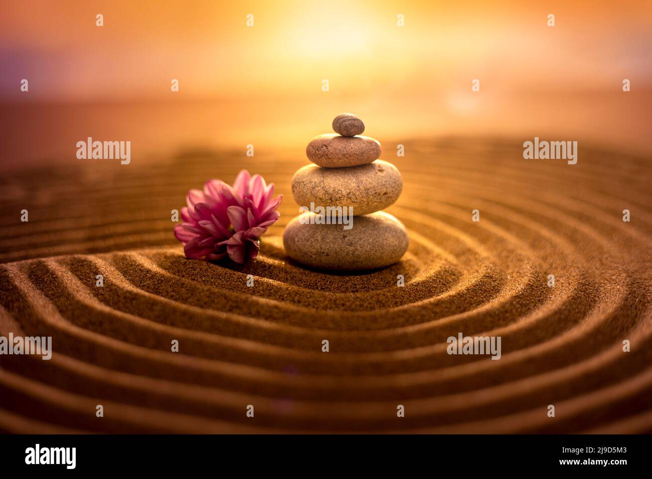 Stack of white zen stones in a relaxing environment on the beach, at ...