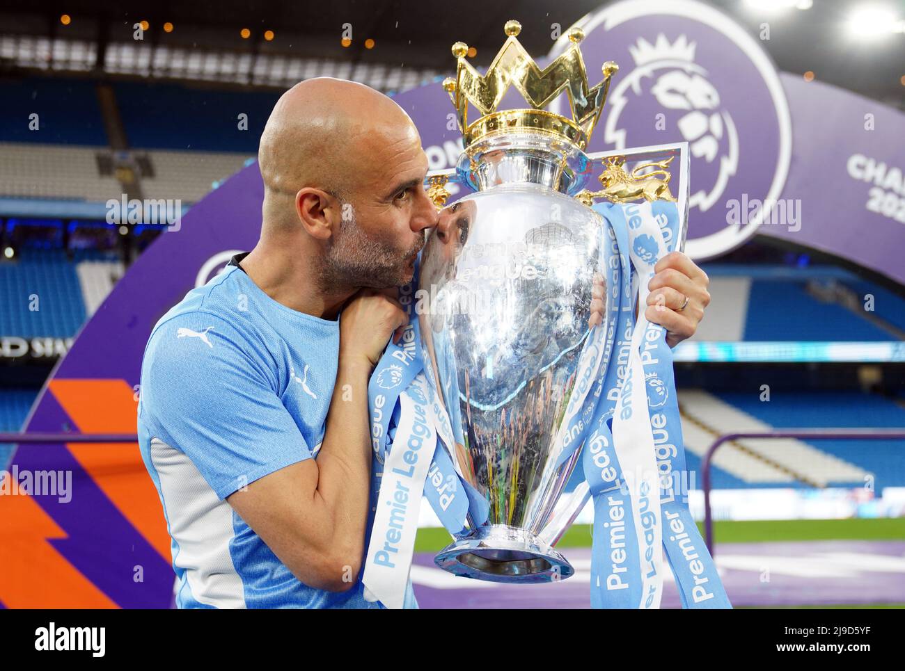 Manchester City manager Pep Guardiola with the Premier League trophy ...