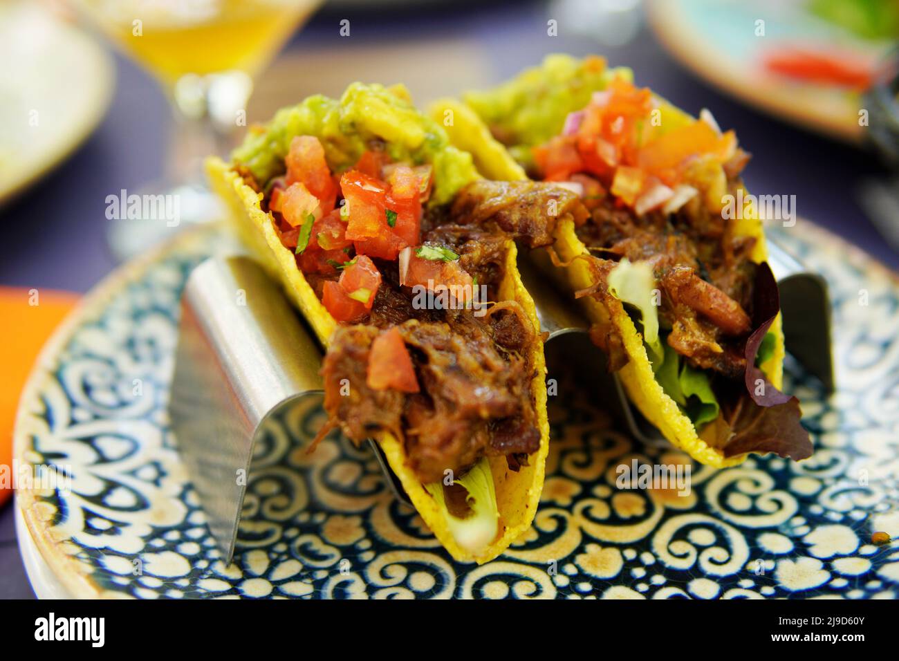 gourmet steak tacos served on the restaurant terrace Stock Photo - Alamy