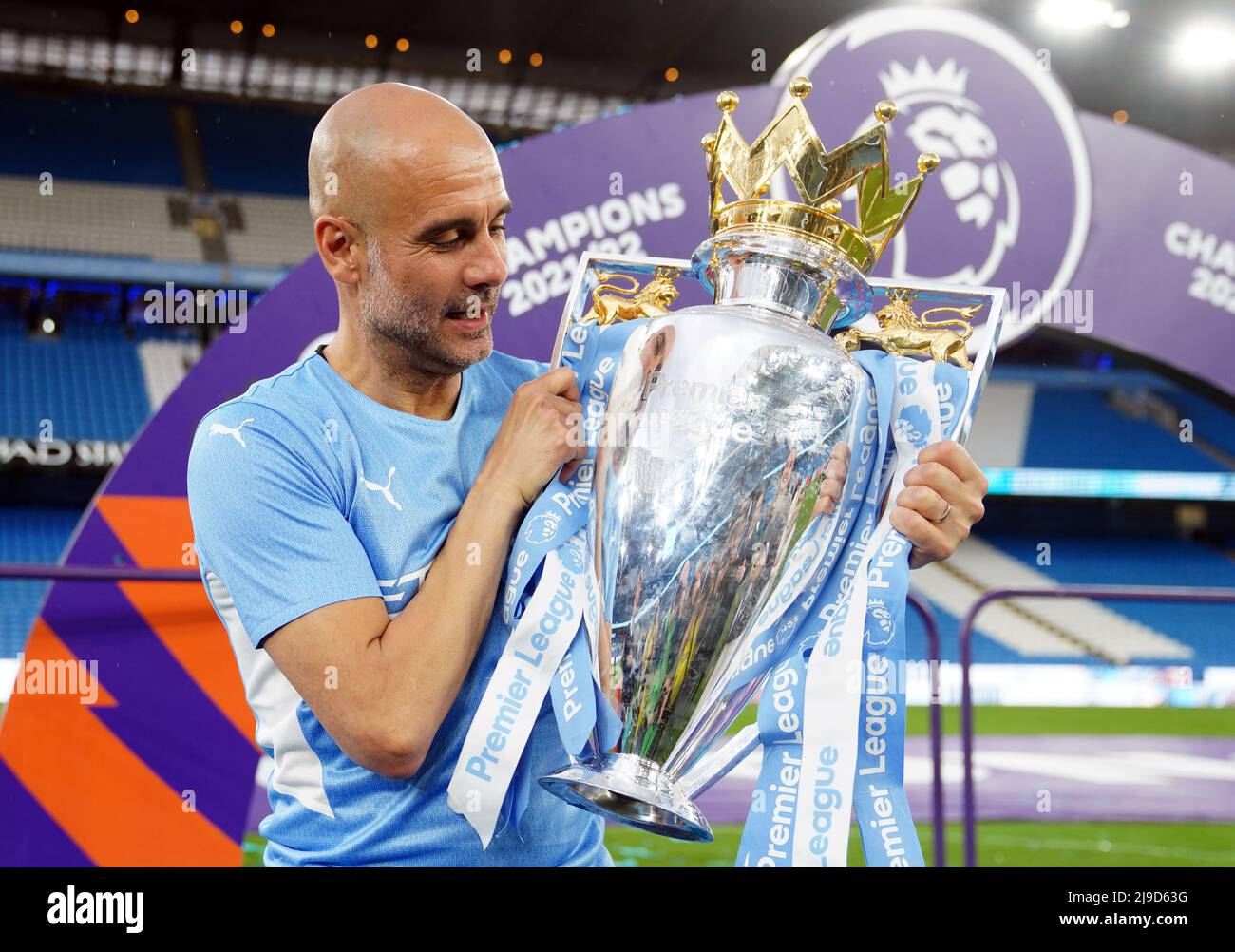 Manchester City manager Pep Guardiola with the Premier League trophy ...