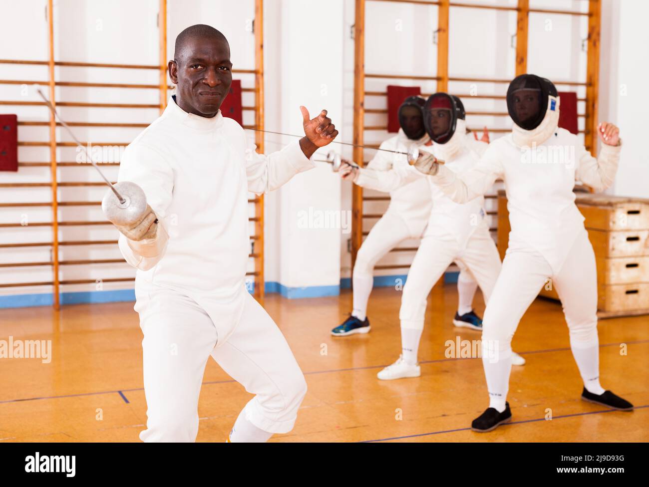 Sporty african american man fencer practicing effective fencing ...
