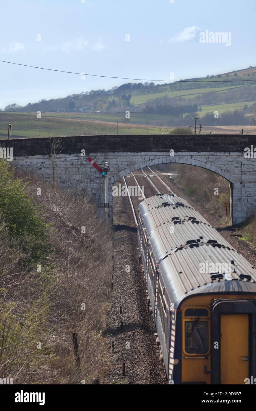 Mechanical railway semaphore signal in the off or clear position with a ...