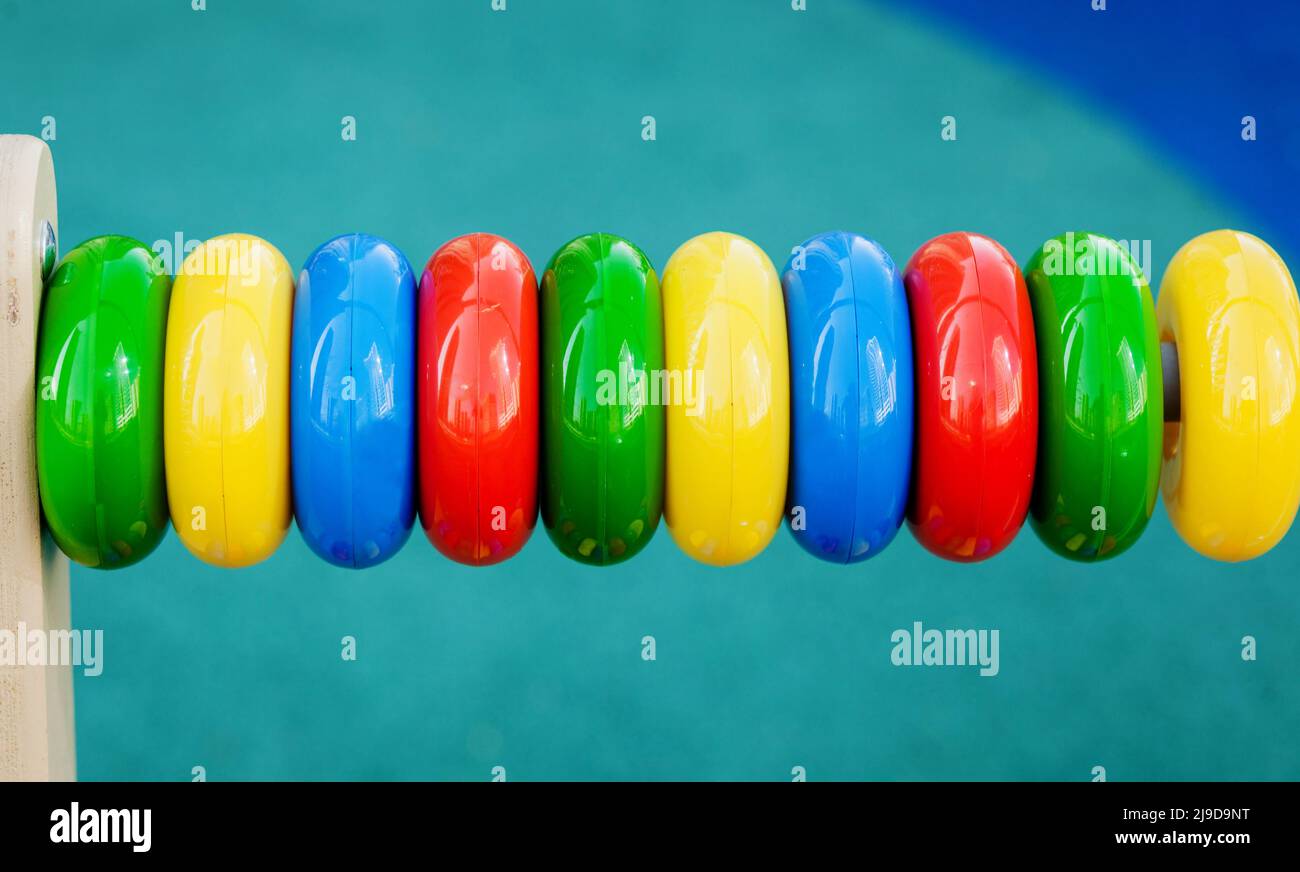 Multi-colored plastic rings for learning on the playground Stock Photo ...