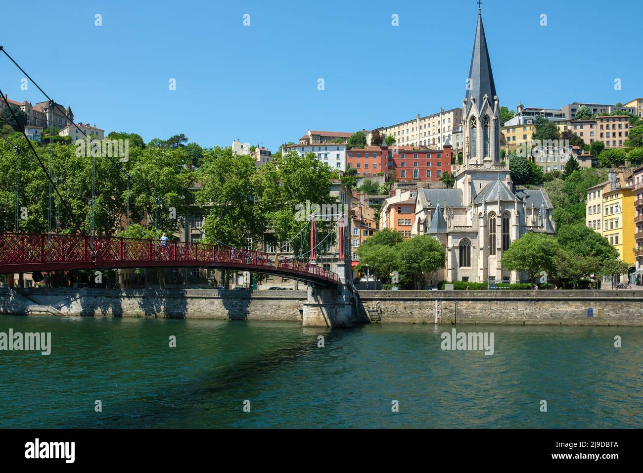 Beautiful view of a pedestrian bridge leading to the picturesque area ...