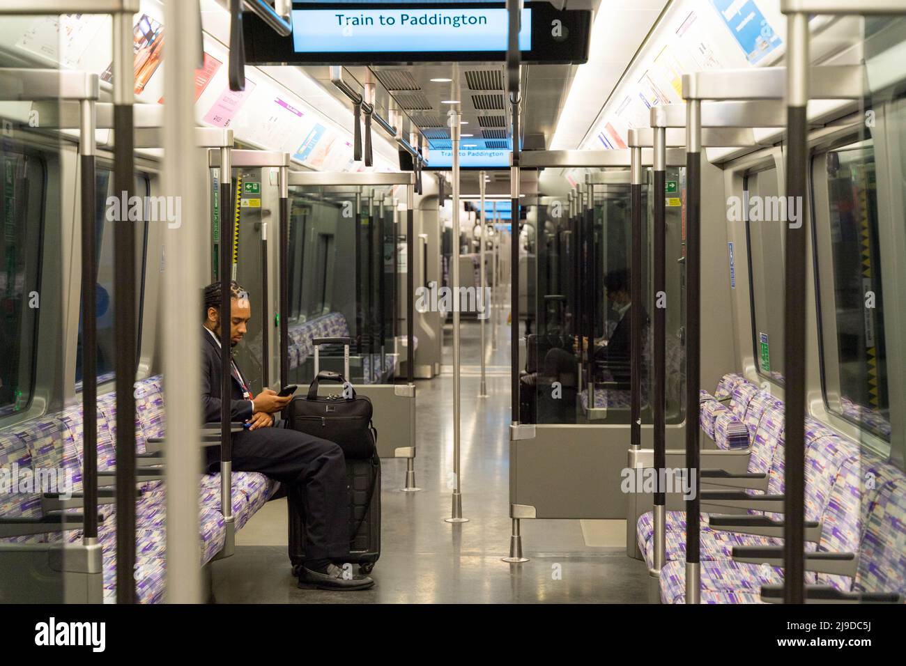train passengers riding the Elizabeth Lind train on sunny day, sunshine ...