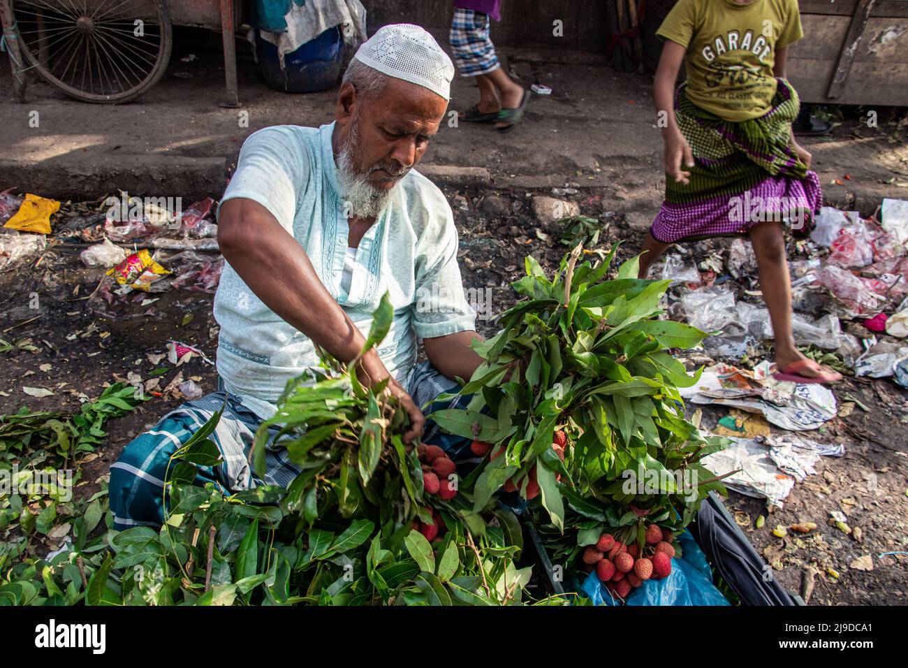 Lichi is a fruit that is very popular in Bangladesh. Vendors are ...