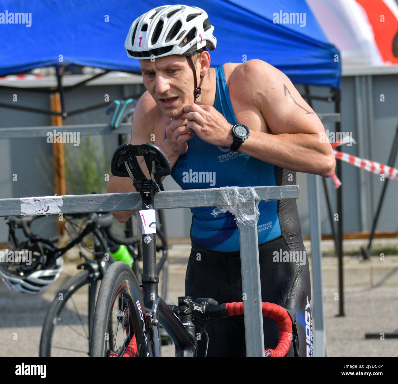 The massive triathlon competition. Аthletes competed in swimming ...
