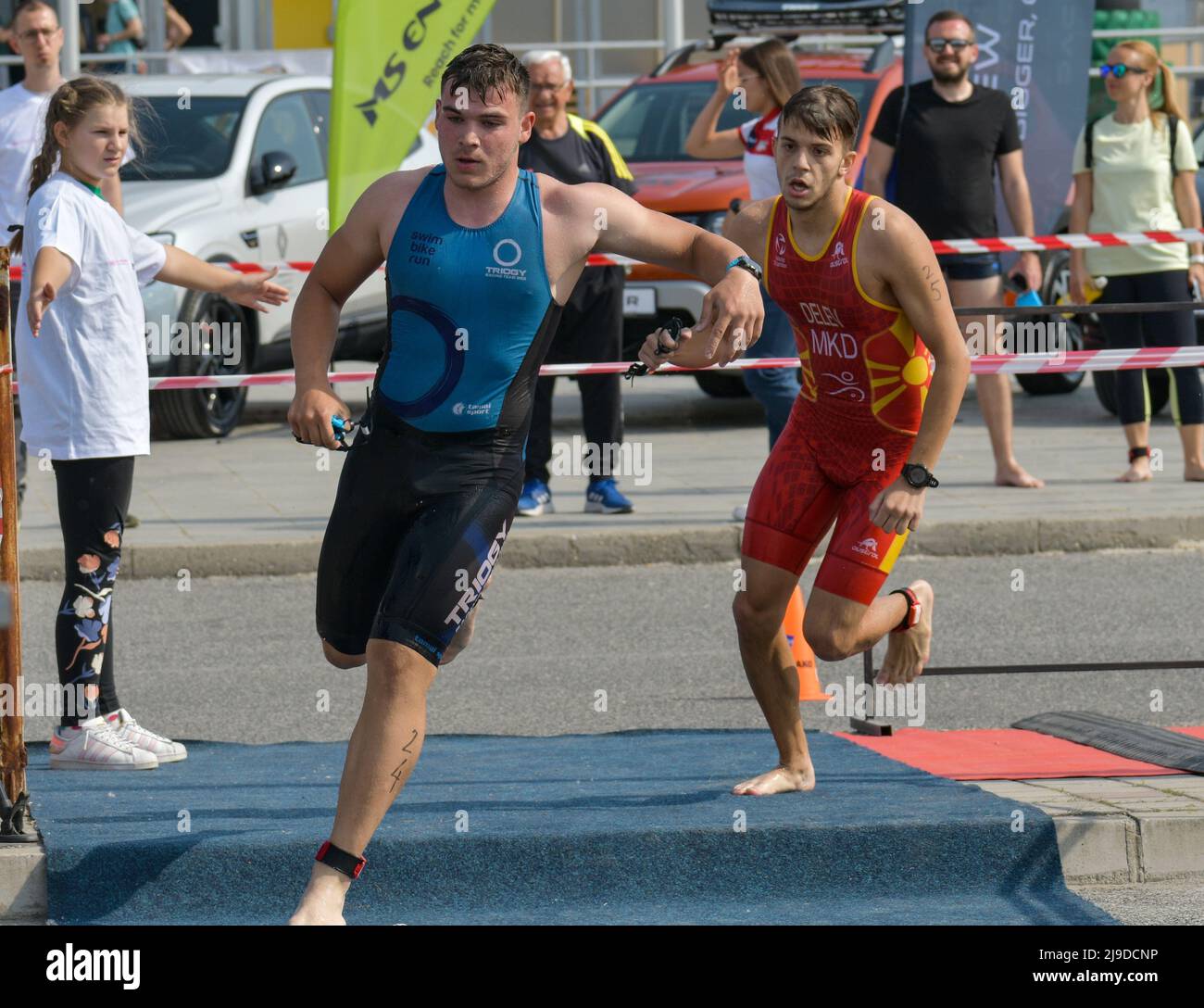 The massive triathlon competition. Аthletes competed in swimming ...