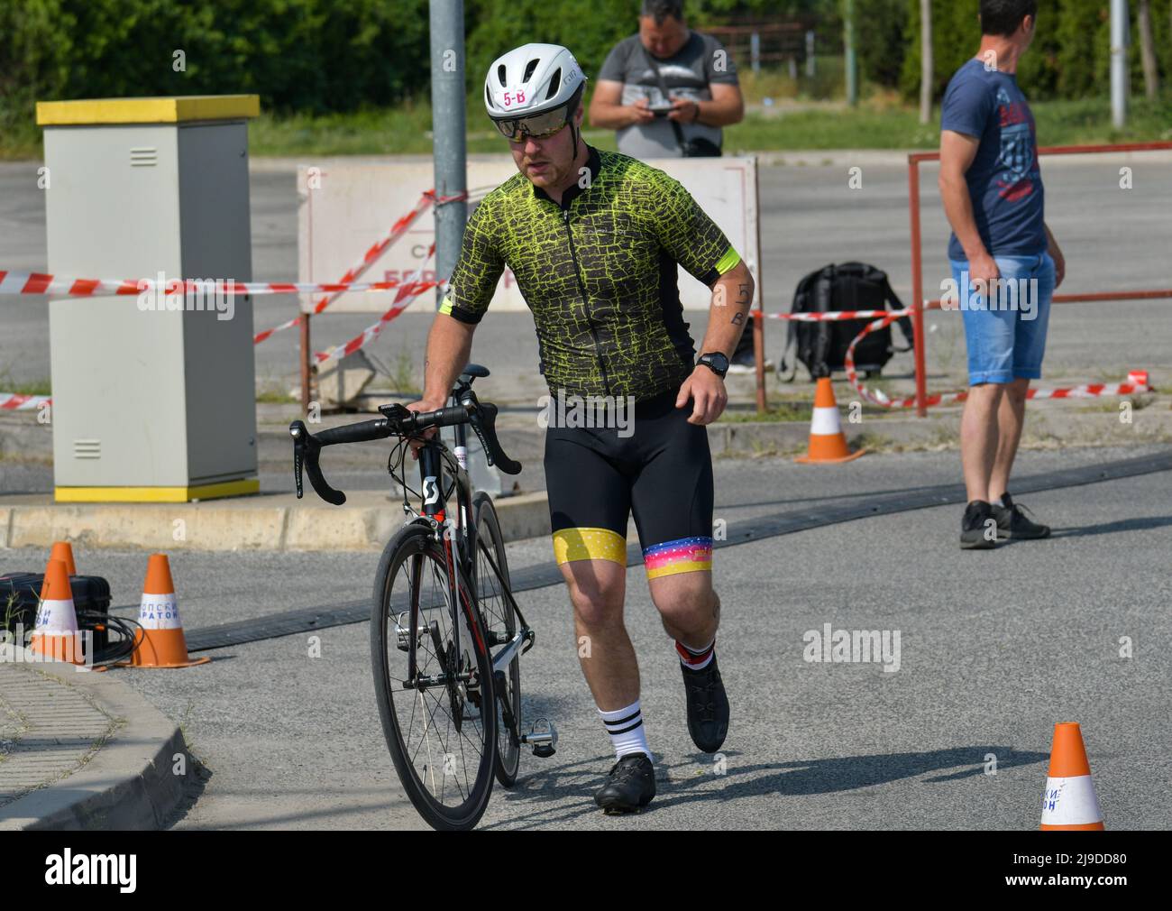 The massive triathlon competition. Аthletes competed in swimming ...