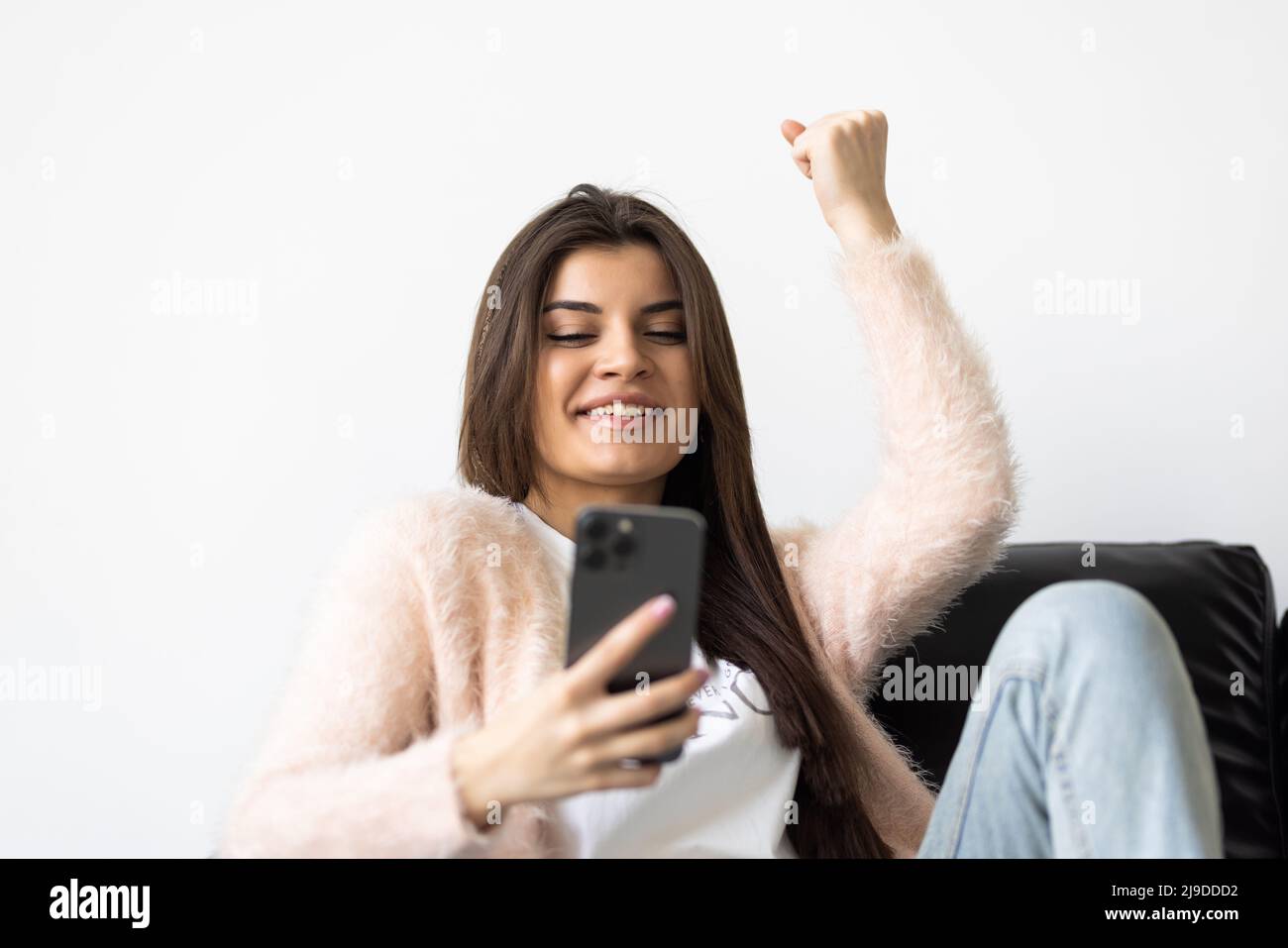Happy excited smartphone user shouting for joy, getting good news ...