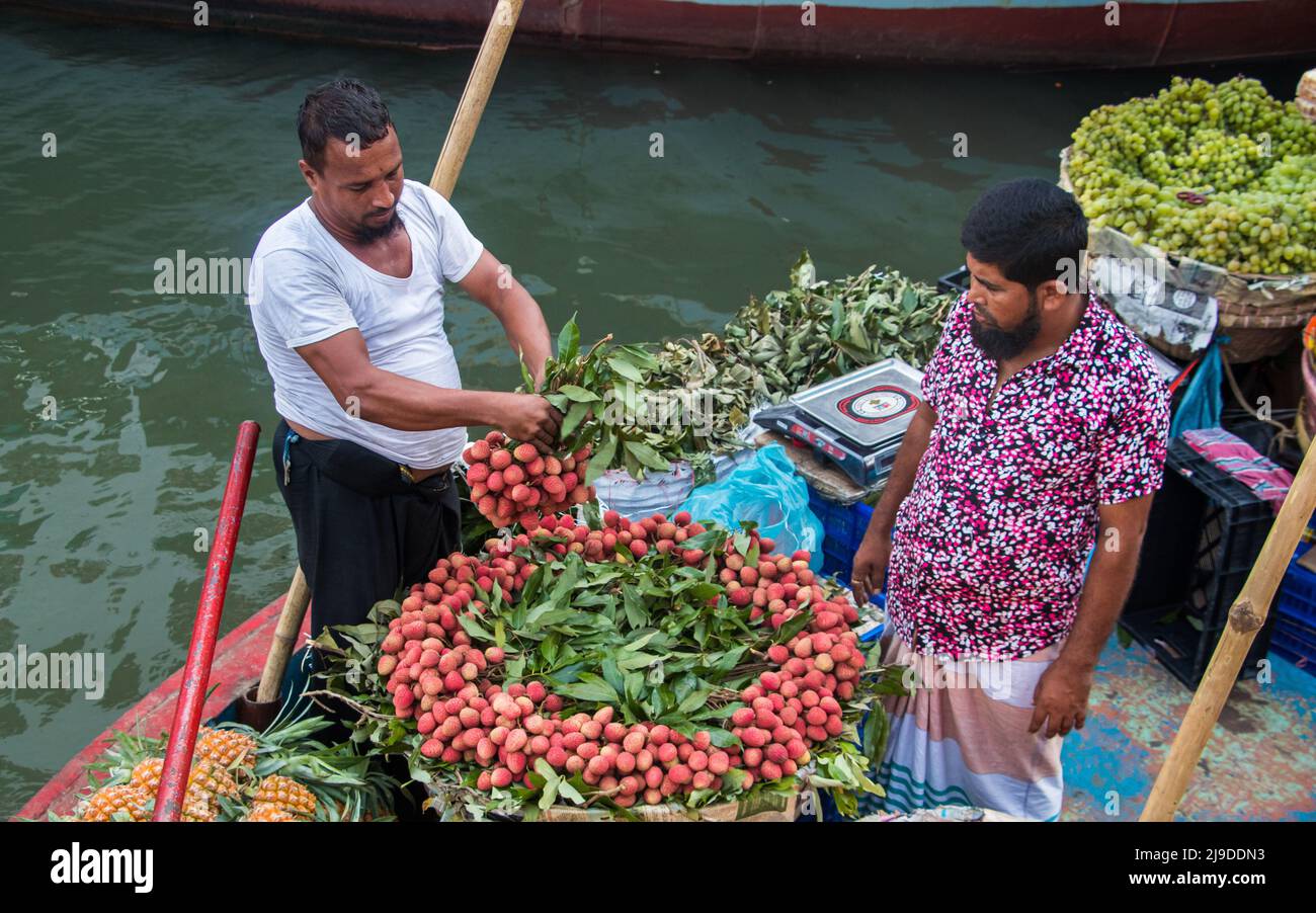 Lichi is a fruit that is very popular in Bangladesh. Vendors are ...