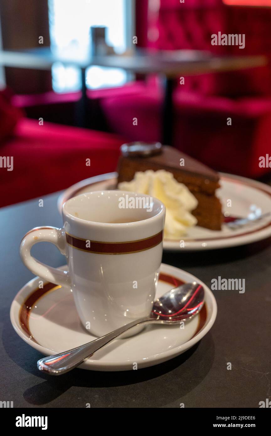 Small cup of black espresso coffee served in traditional cafe in Vienna ...