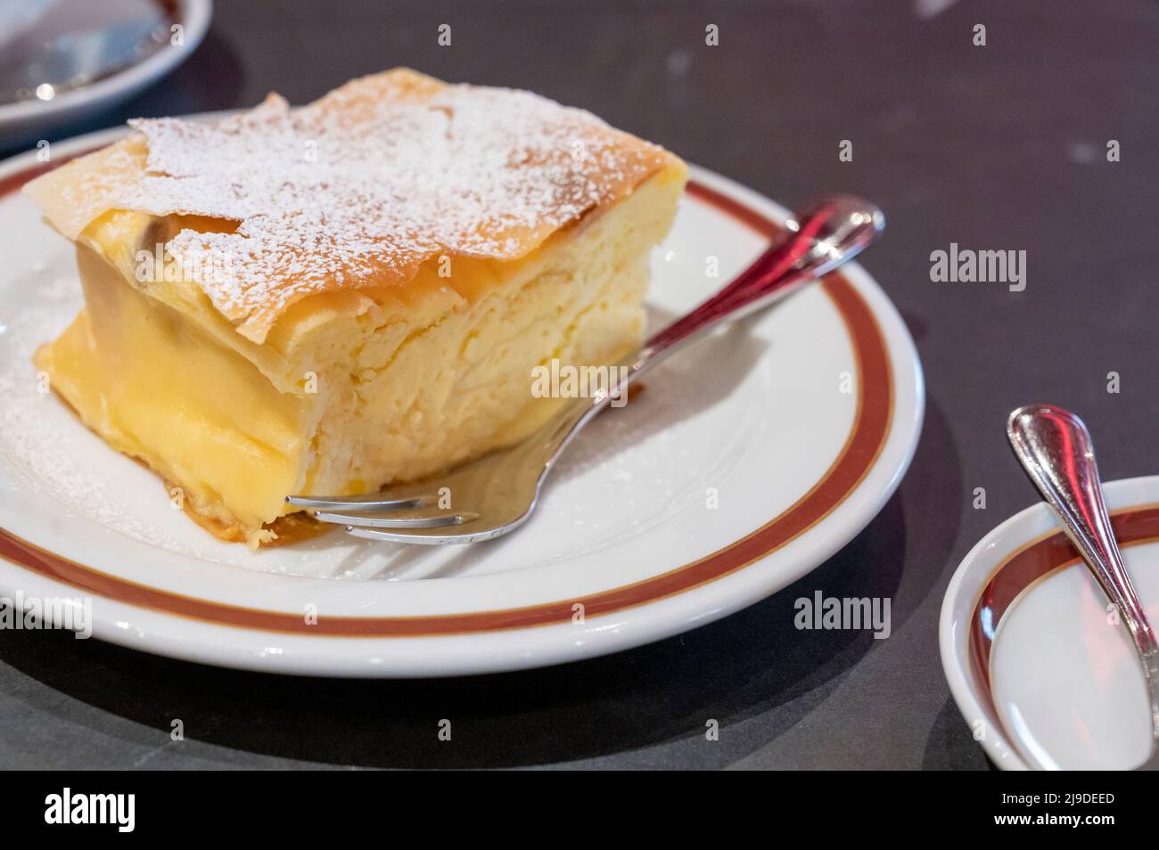 Austrian sweet dessert, filled with white cheese strudel served warm in ...