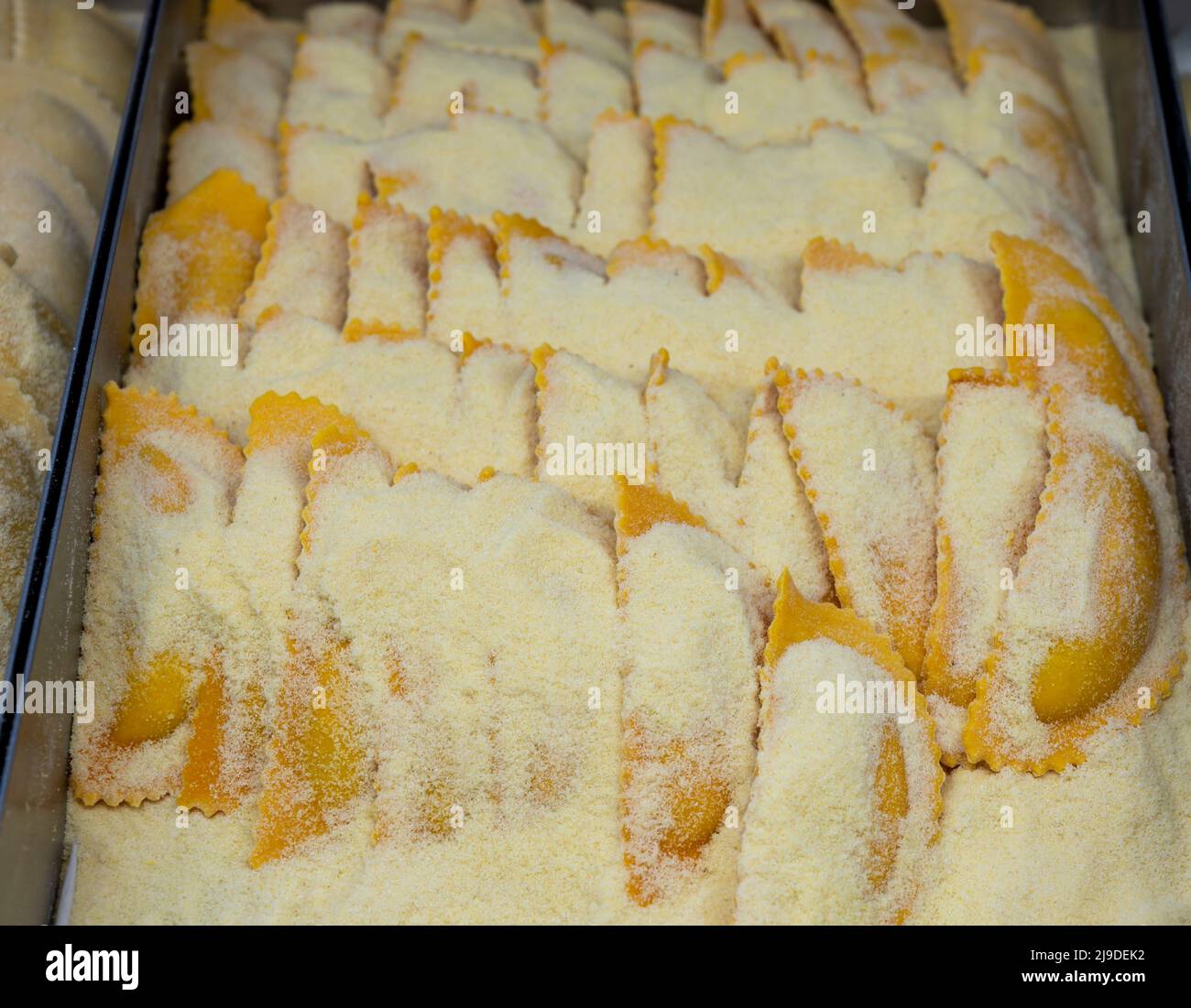 Italian food, handmade mezzaluna pasta ravioli stuffed with four ...