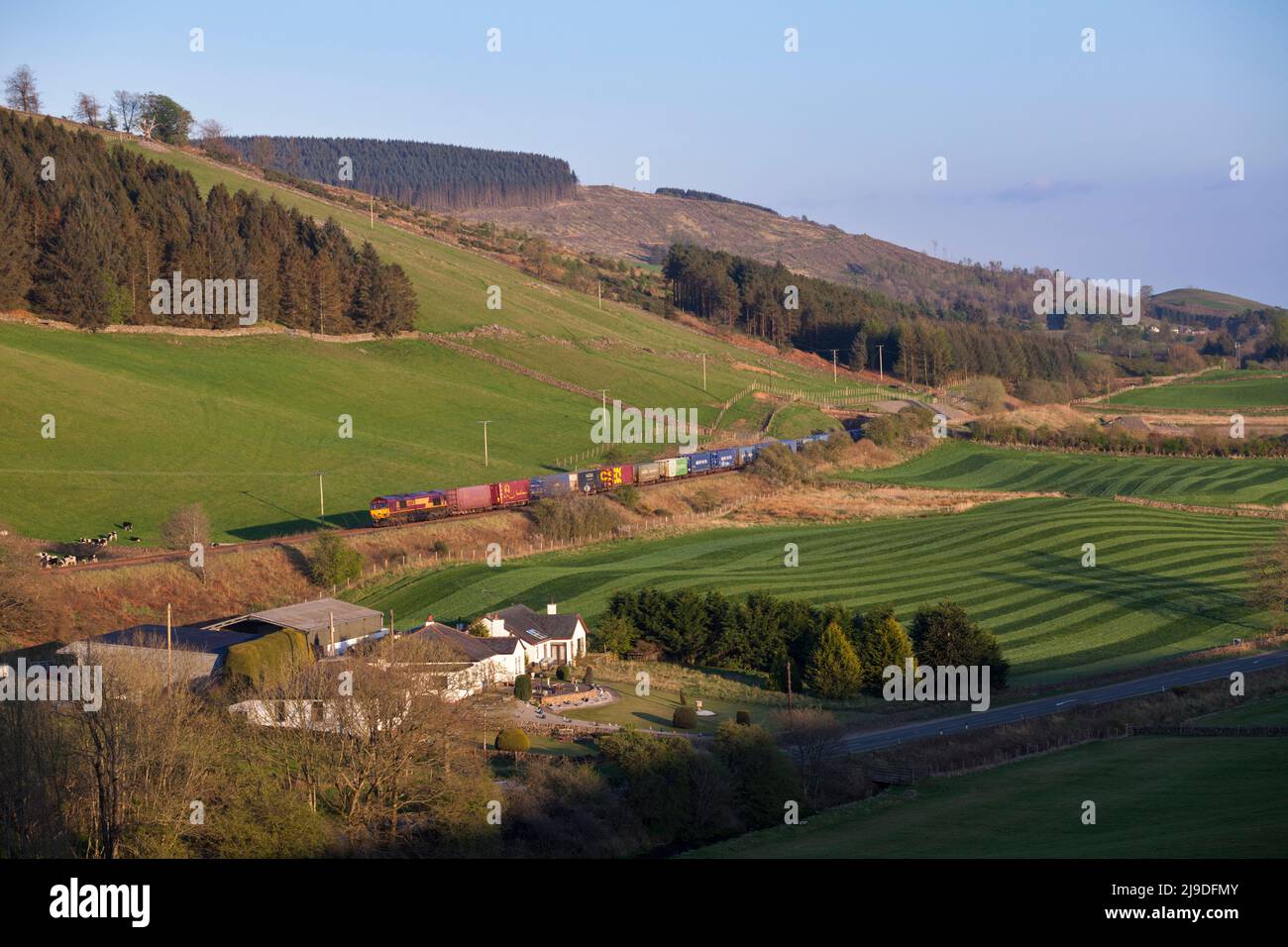 DB Cargo class 66 diesel locomotive 66164 hauling an intermodal ...