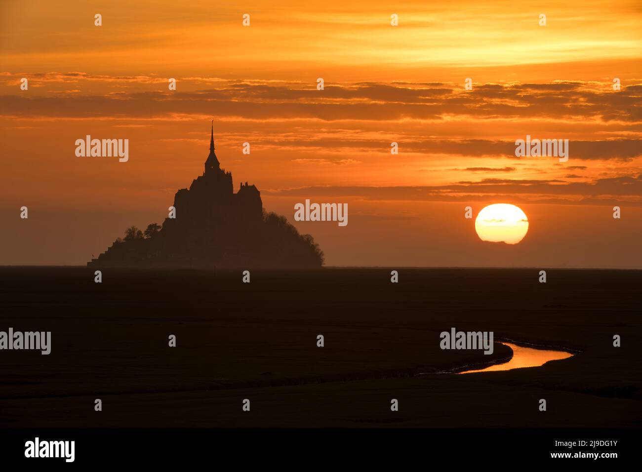 Beautiful sunset view of historic landmark Le Mont Saint-Michel in Normandy, France Stock Photo ...