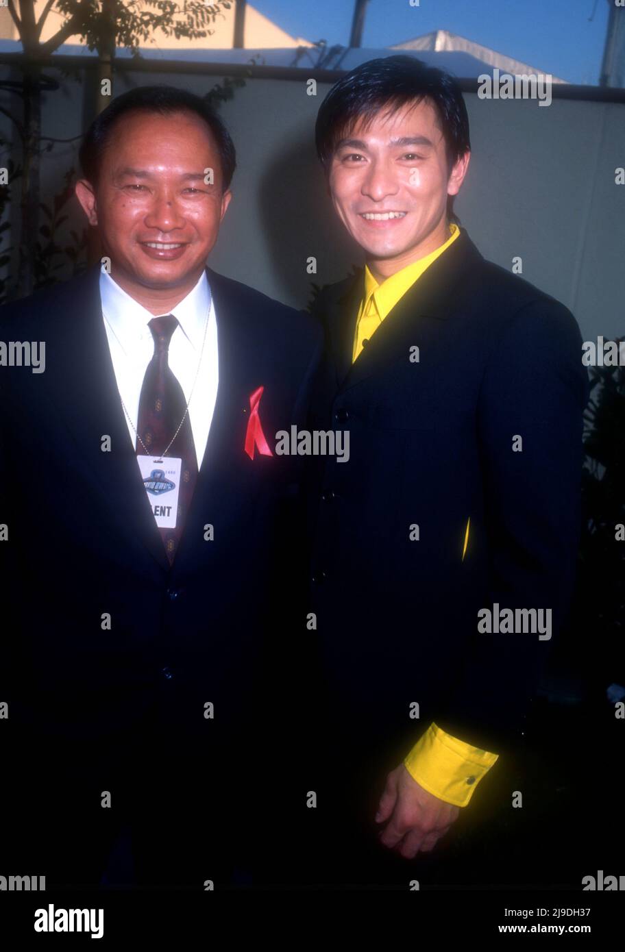 Burbank, California, USA 8th June 1996 Director John Woo and Actor Andy ...