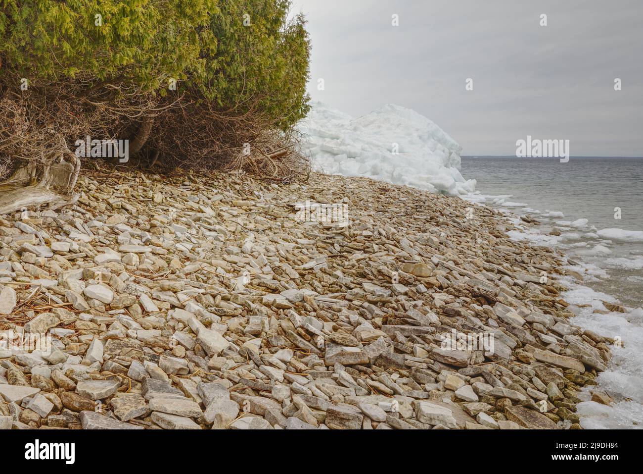 Ice mountain on shoreline Stock Photo - Alamy