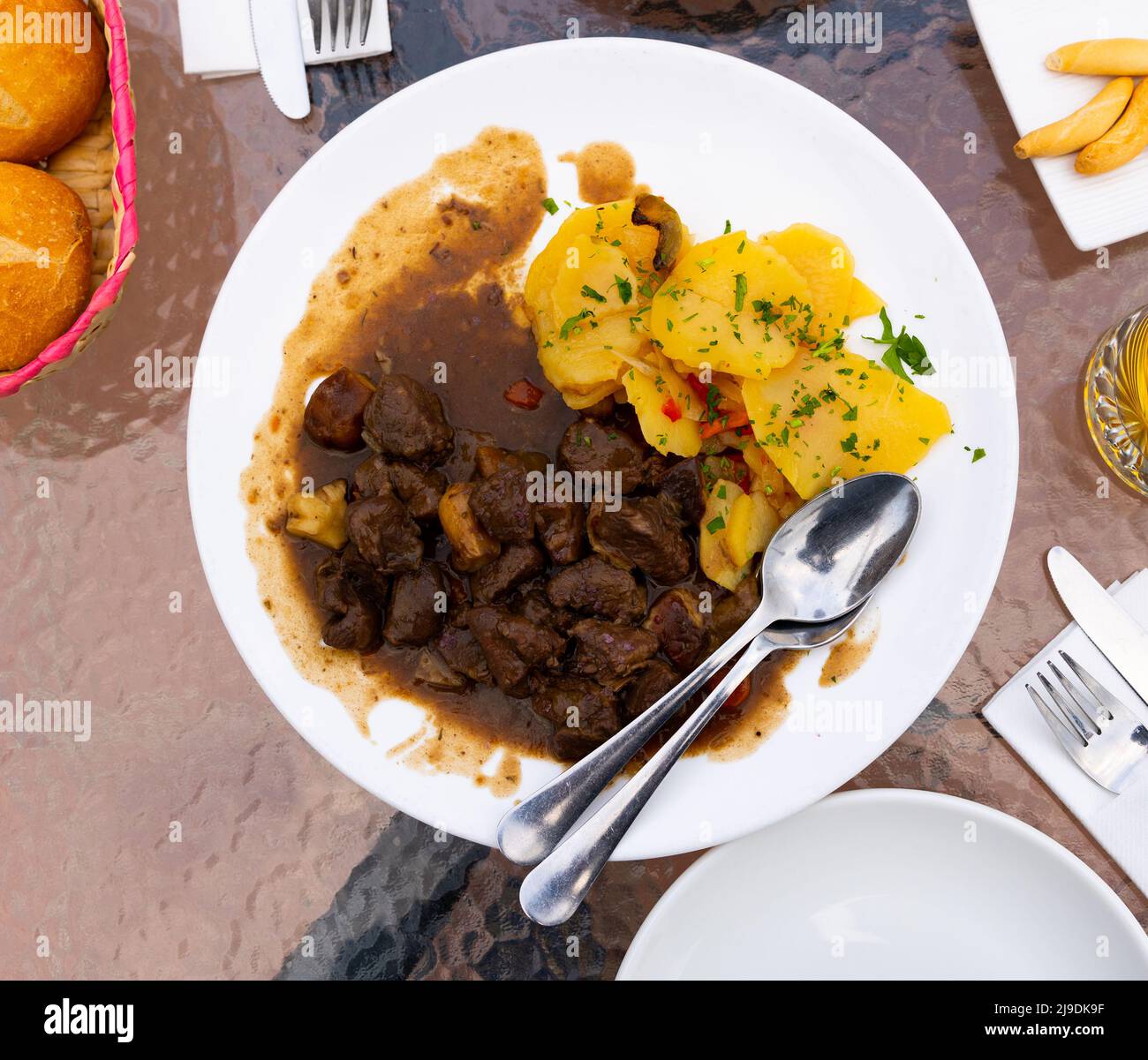 Venison ragout with port wine, thyme and mushroom aroma. Traditional ...