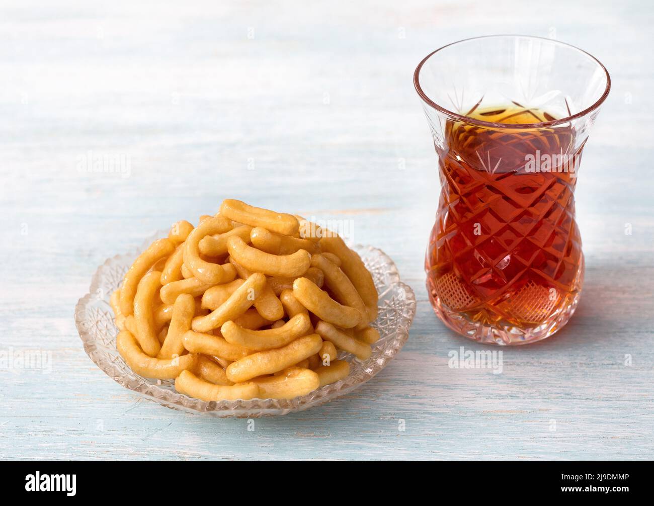 Chak chak, pieces of dough in honey, tatar traditional dessert on light ...