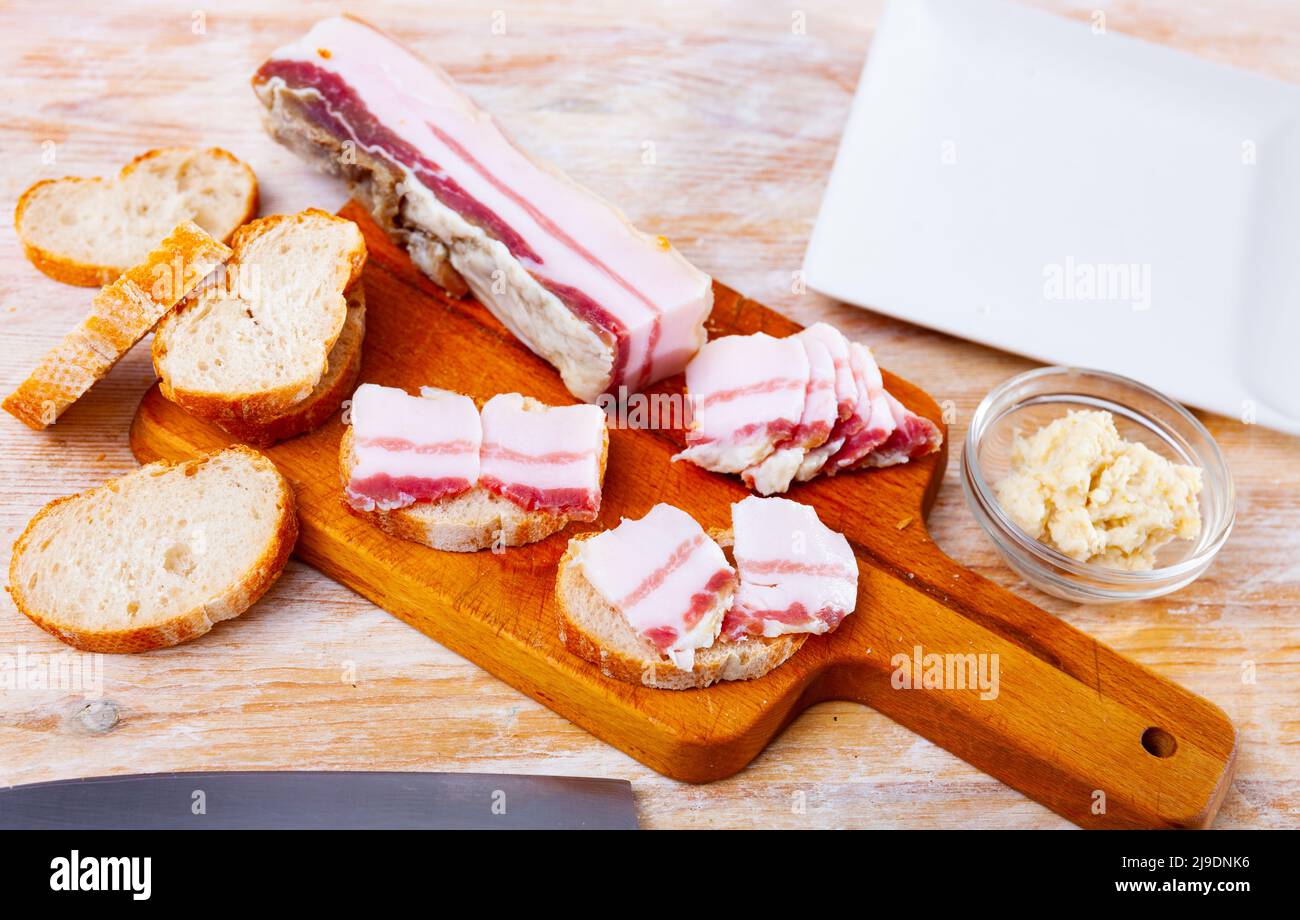 Traditional Russian and Ukrainian food, salted smoked pork bacon with ...