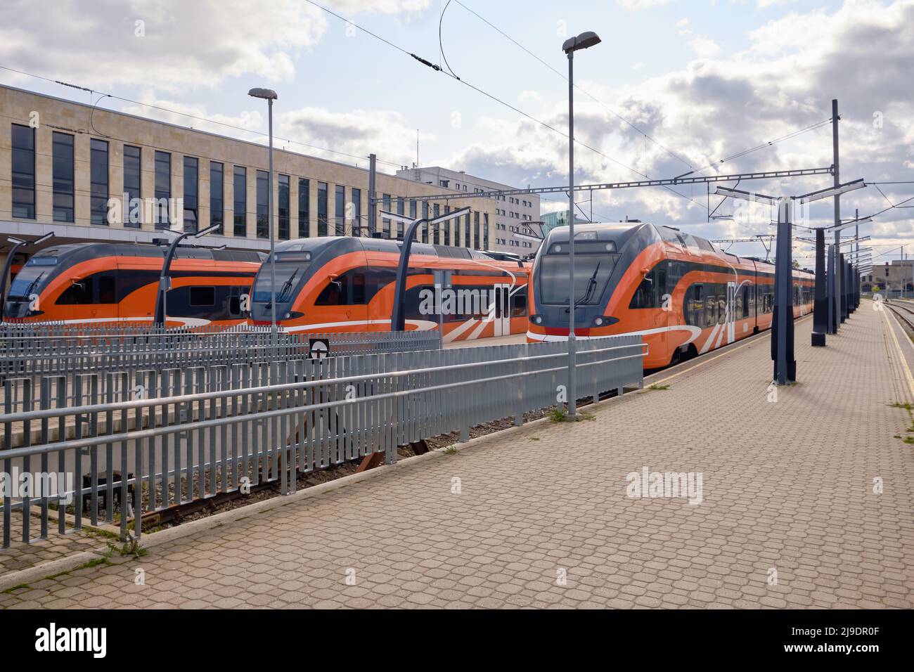 Three red modern trains in Tallinn main station, Estonia Stock Photo ...