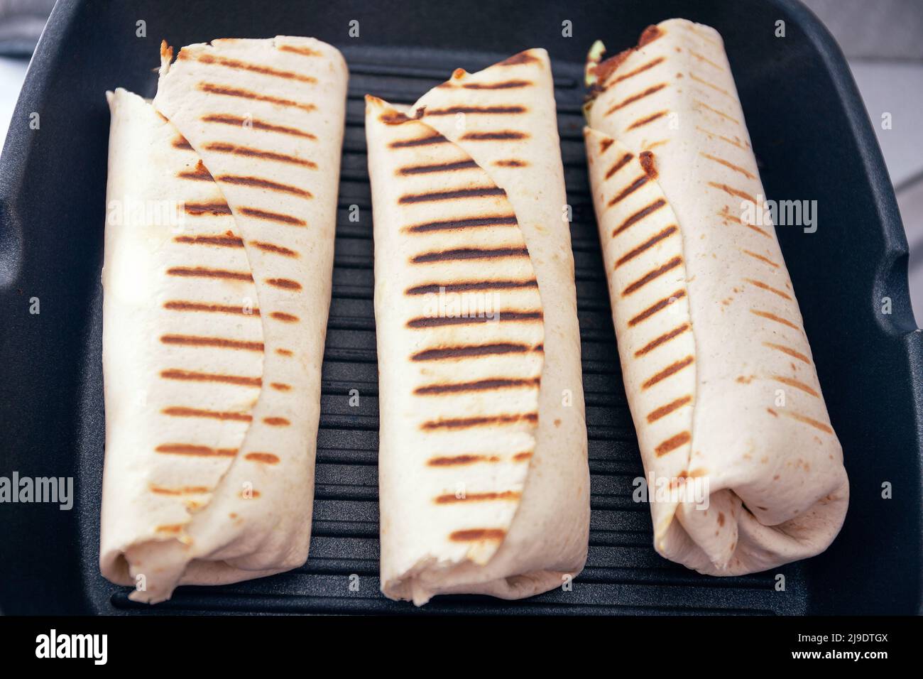 Shawarma or kebab wrap recipe filled with grilled meat and vegetables ...