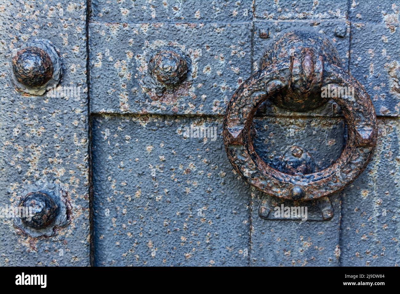 Door pull on a fortified gray door to the 1926 Medieval-style Hammond ...