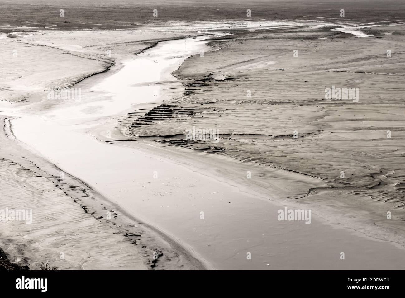 The beautiful and curious tidal mud flat Stock Photo - Alamy