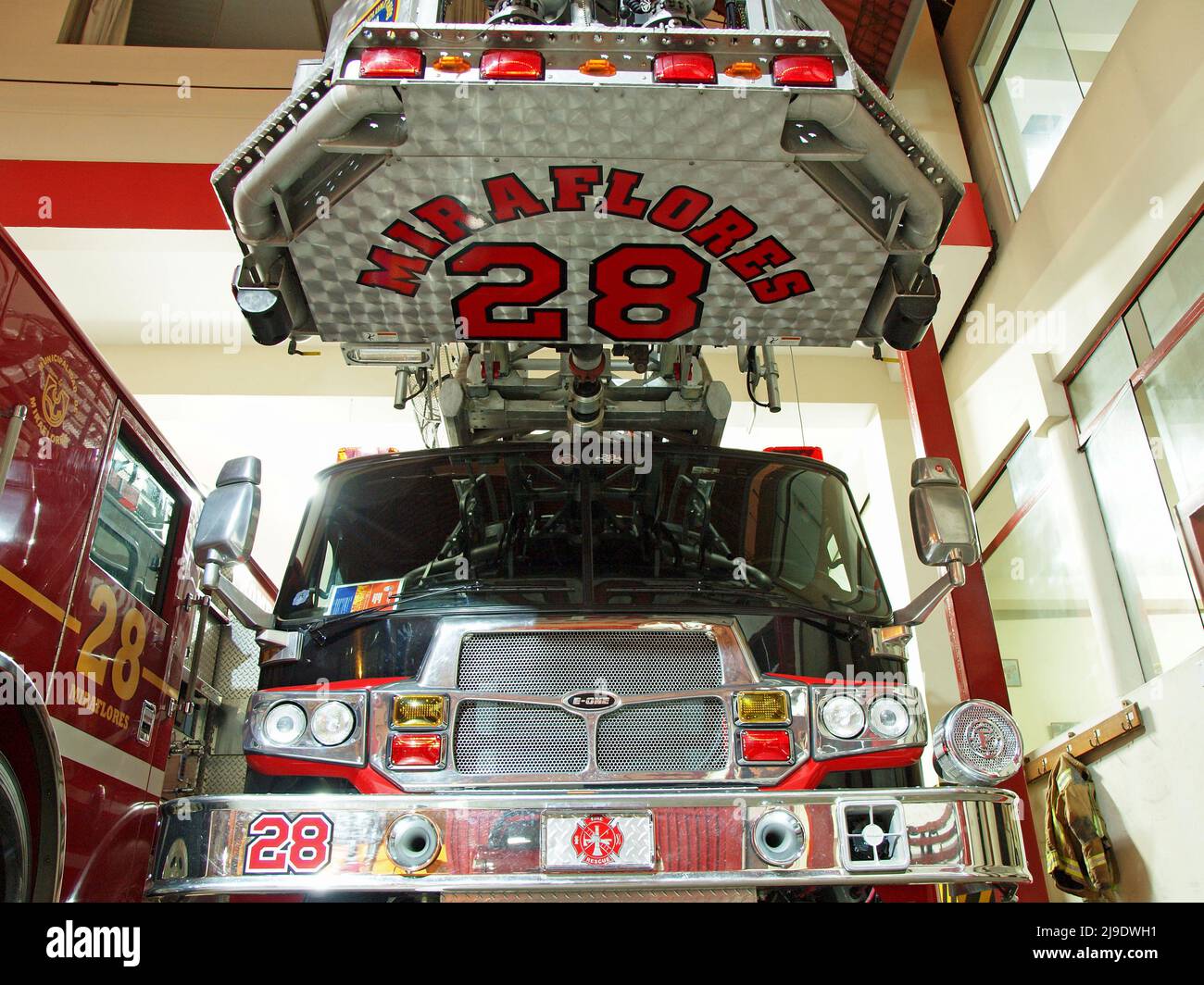 Front view of an E-ONE aerial ladder fire truck of the "Miraflores 18 ...