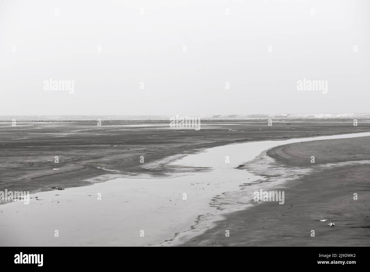 The beautiful and curious tidal mud flat Stock Photo - Alamy