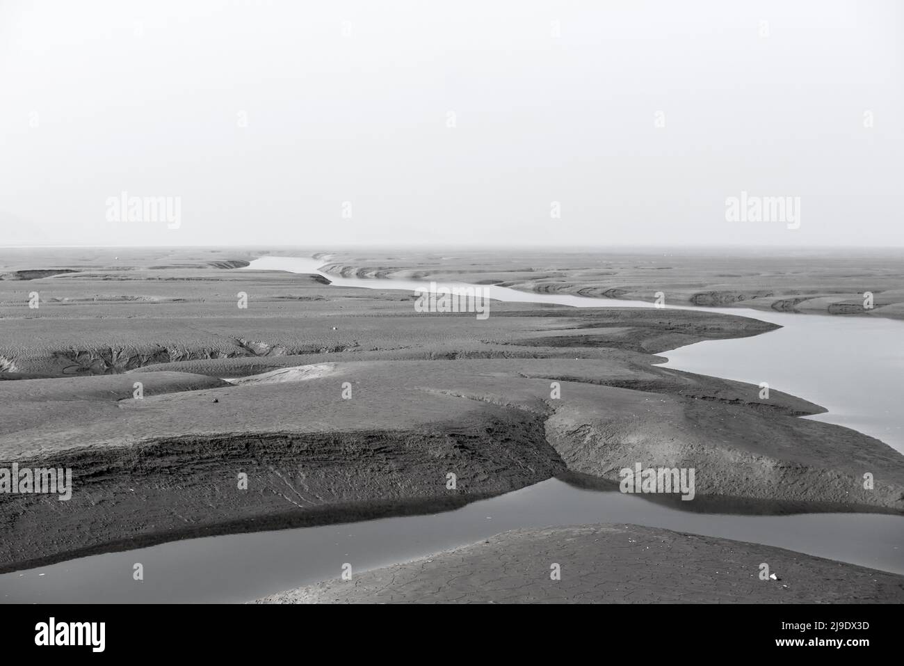 The beautiful and curious tidal mud flat Stock Photo - Alamy